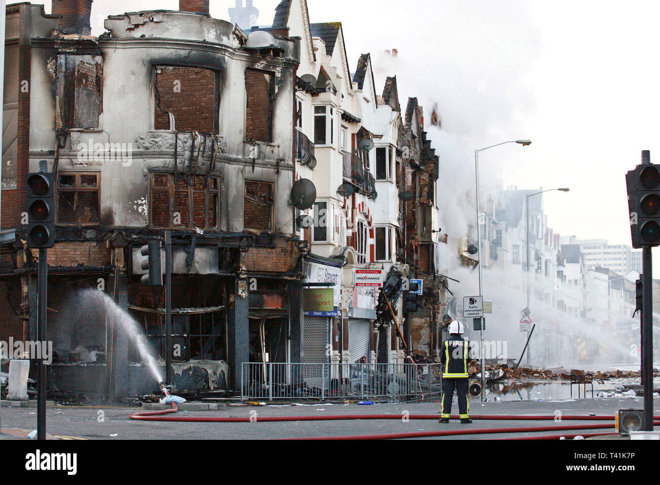 Riot rioting fire blaze firefighter hi-res stock photography and images ...