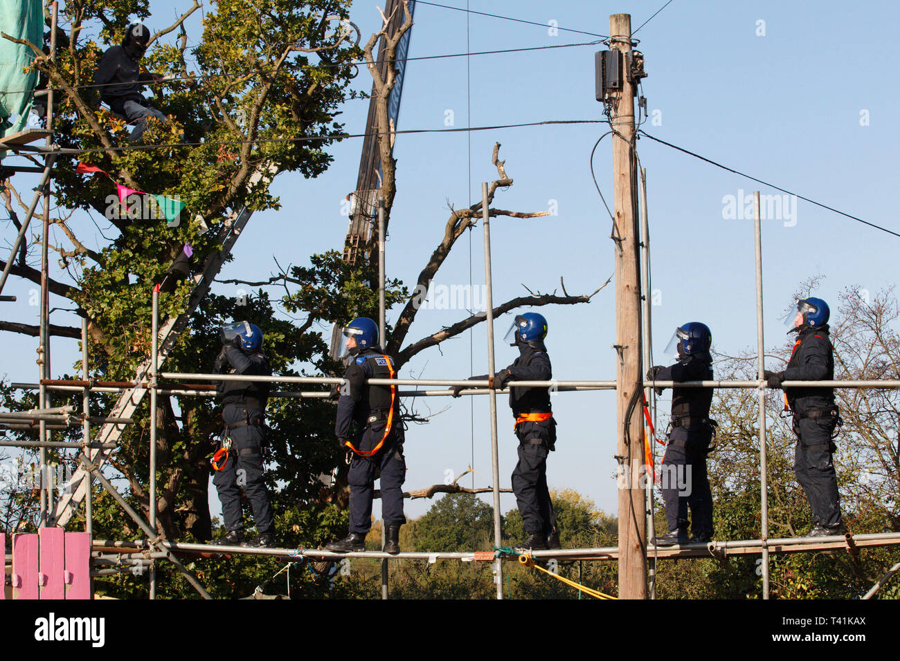 Police climbing team move into place to begin removing protesters. The ...