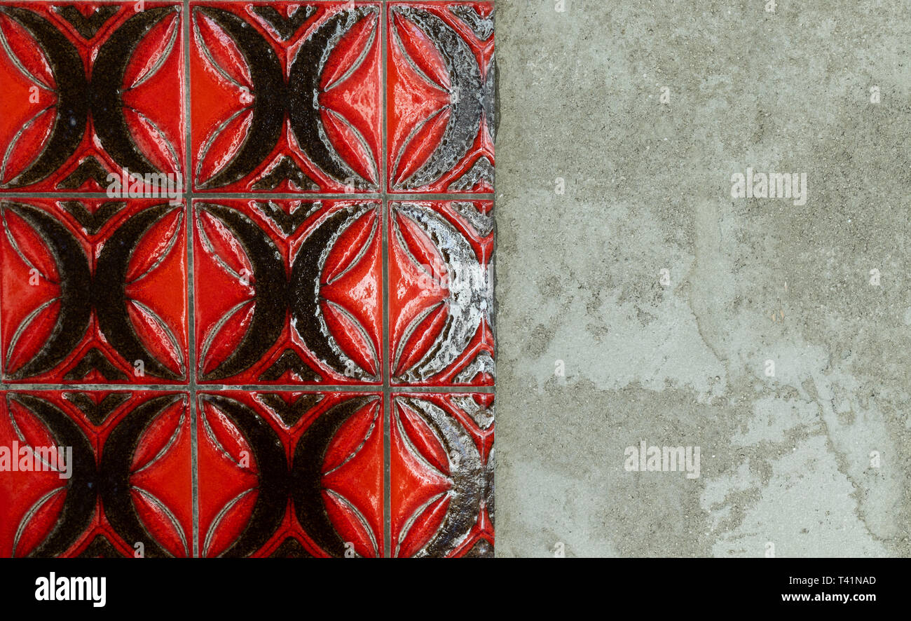red tiles wall besides cracked and destroyed undersurface Stock Photo ...