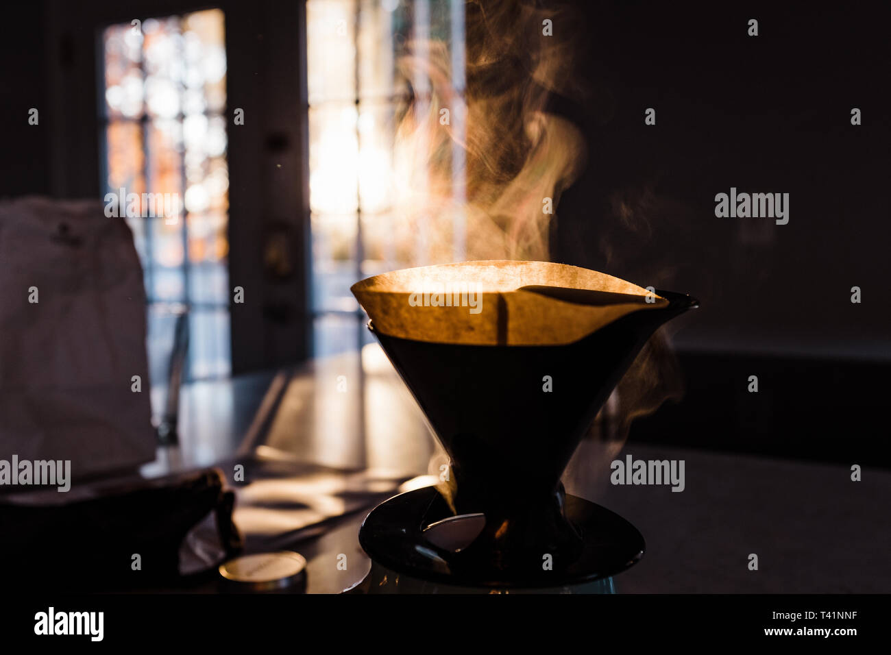 Coffee and steam in sunshine Stock Photo - Alamy