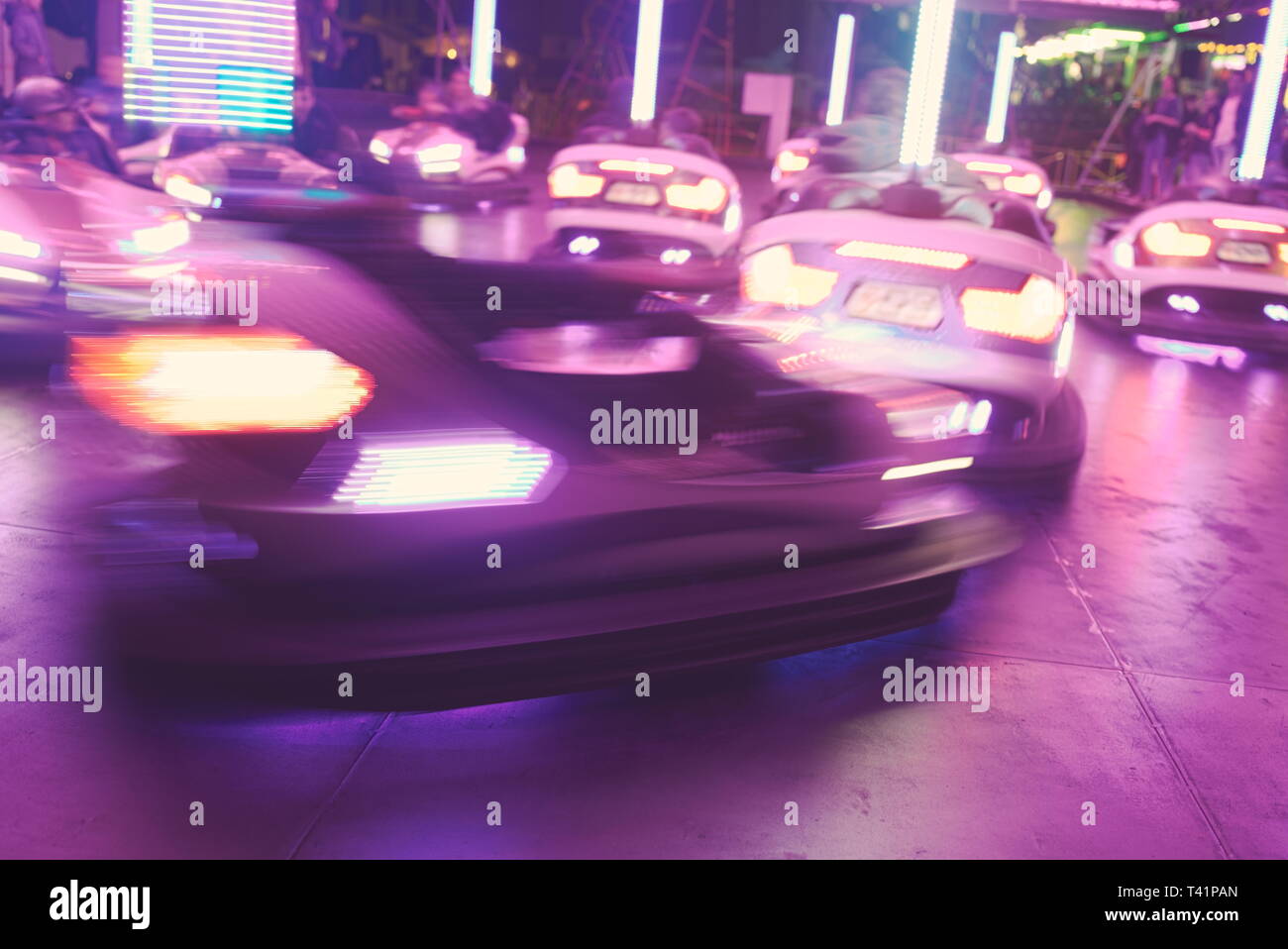 Fast Moving Bumper Cars at Town Fair Stock Photo - Alamy