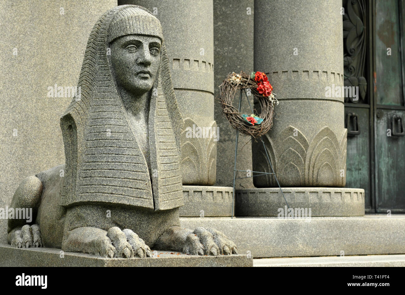 An Egyptian Revival temple mausoleum guarded by sphinx sculptures marks ...