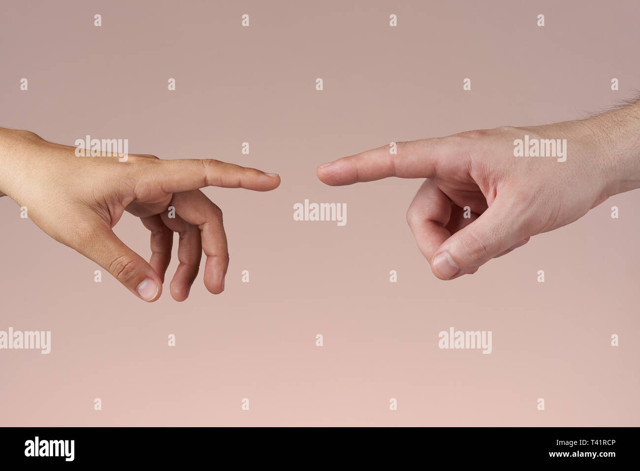 Isolated human fingers reaching each other. Love, connect and help ...