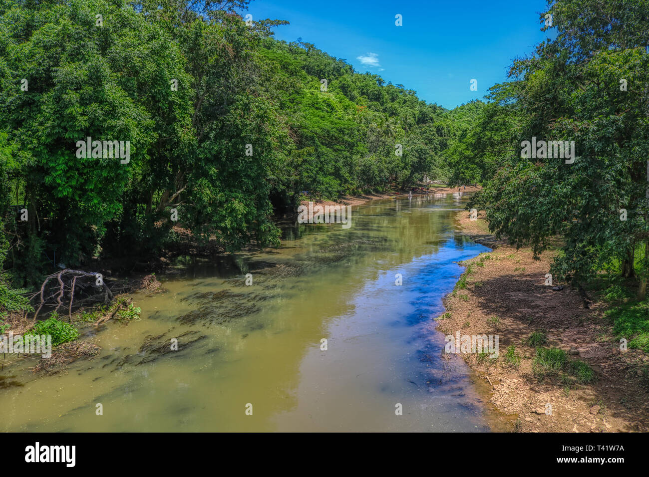 This unique photo shows a small natural river that passes through ...
