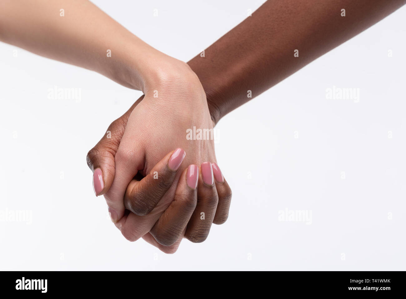 Feeling equal. Powerful respectful women feeling equal shaking hands ...