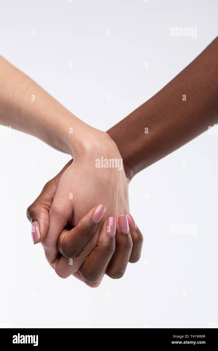 Nice manicure. Dark-skinned woman with nice manicure shaking hand of ...