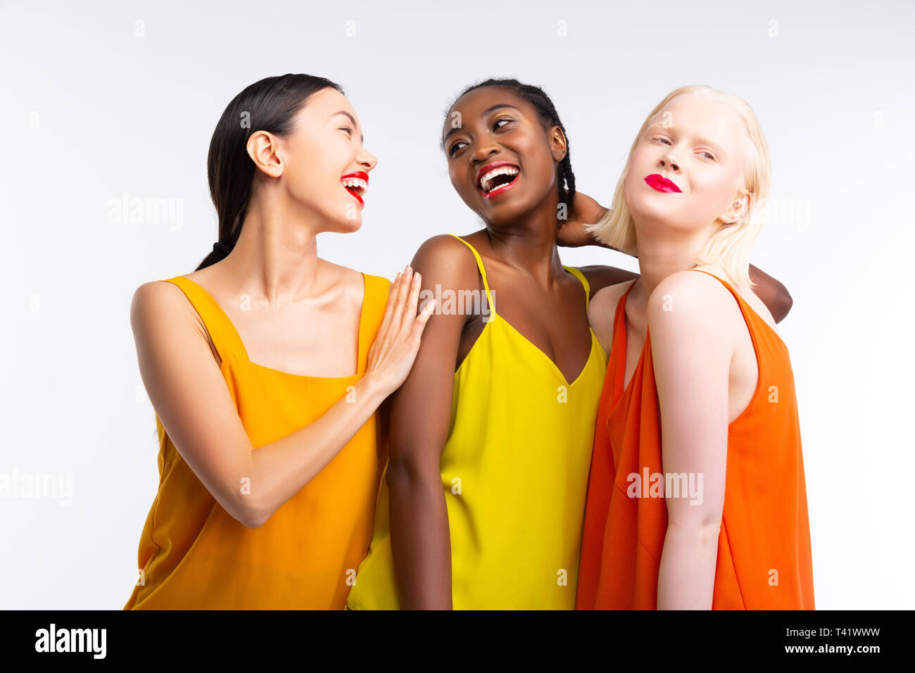 Women with different skin color wearing bright colorful clothes Stock ...