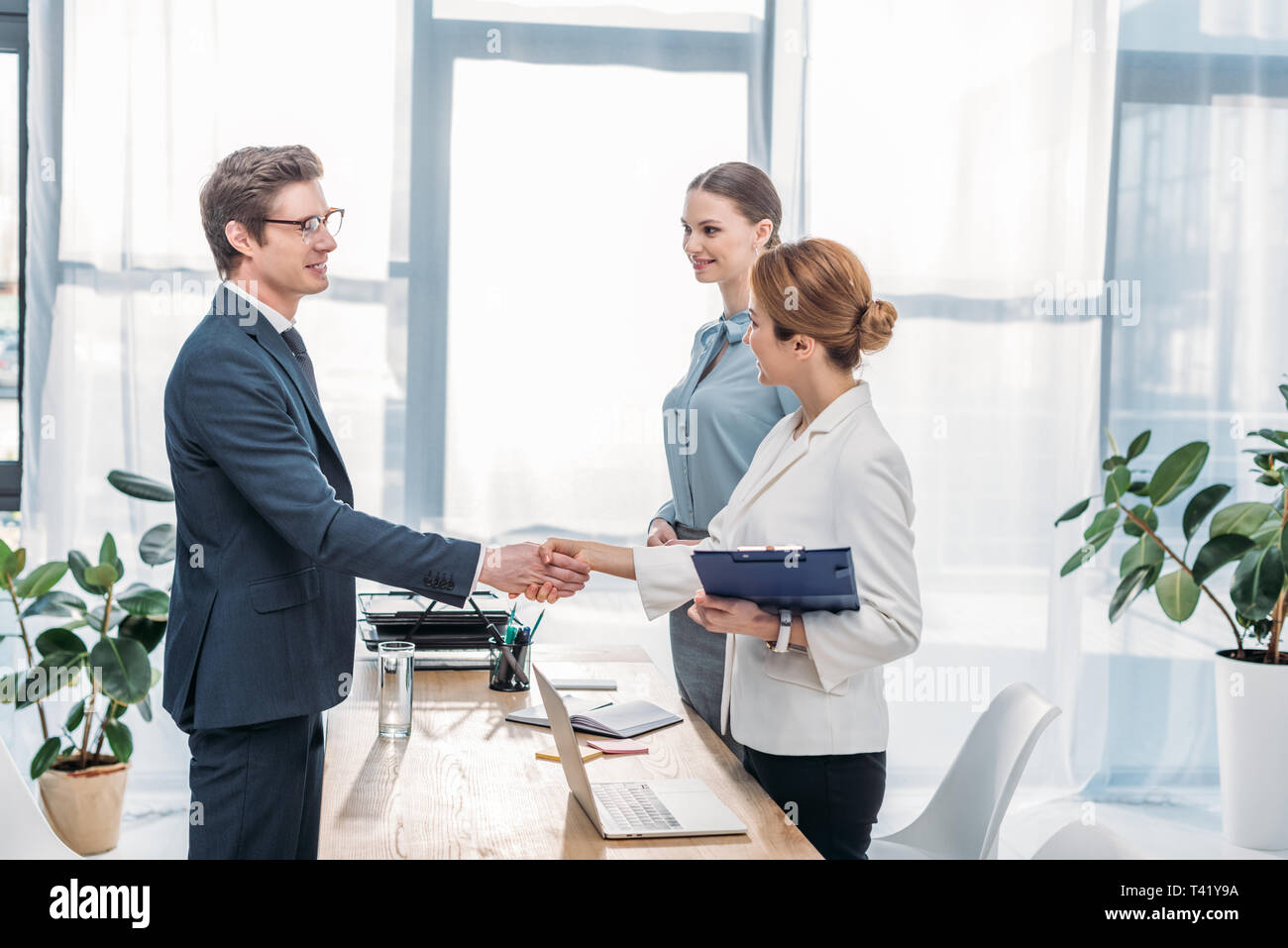 happy employee shaking hands with recruiter on job interview Stock ...