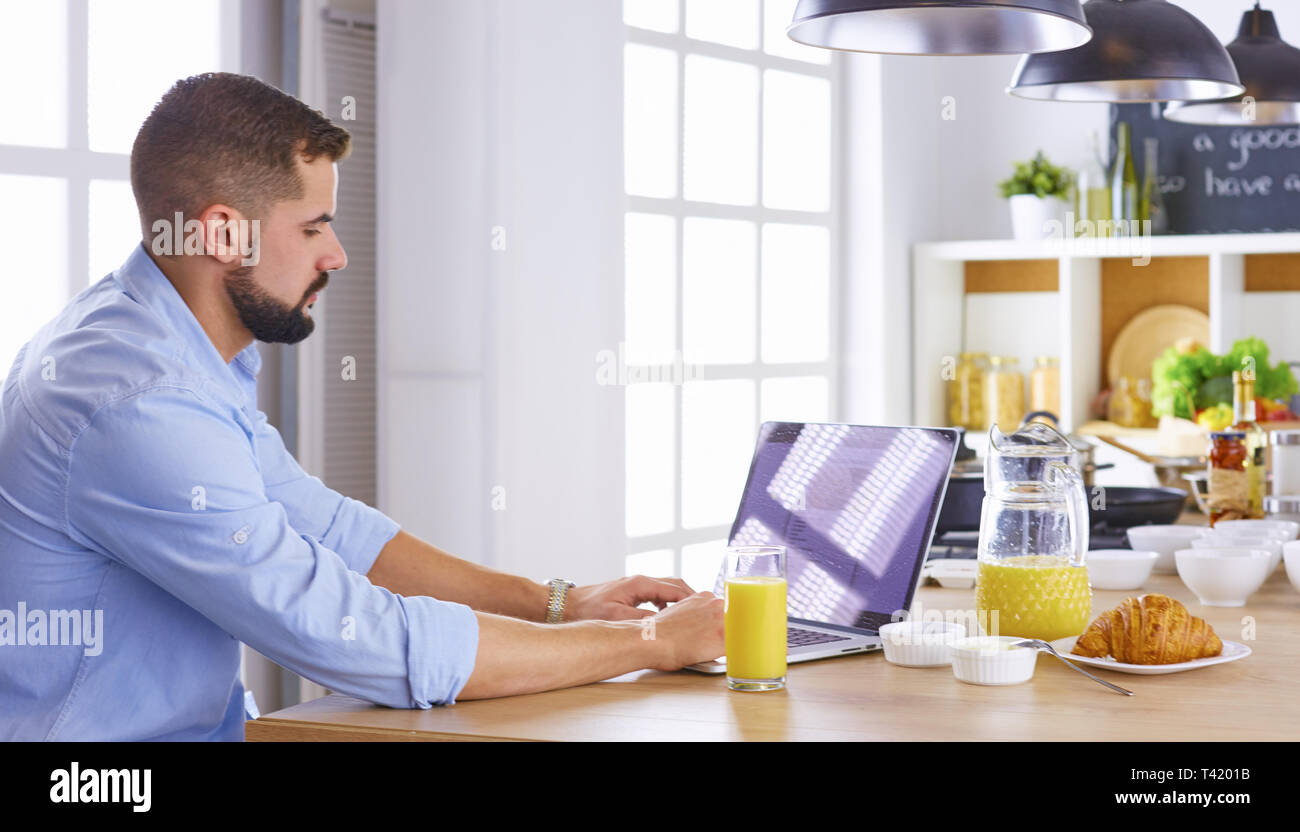 a business man breakfasts with notebook and juice Stock Photo - Alamy