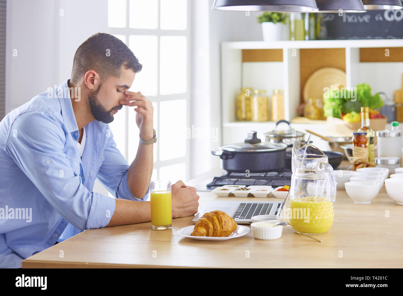 a business man breakfasts with notebook and juice Stock Photo - Alamy