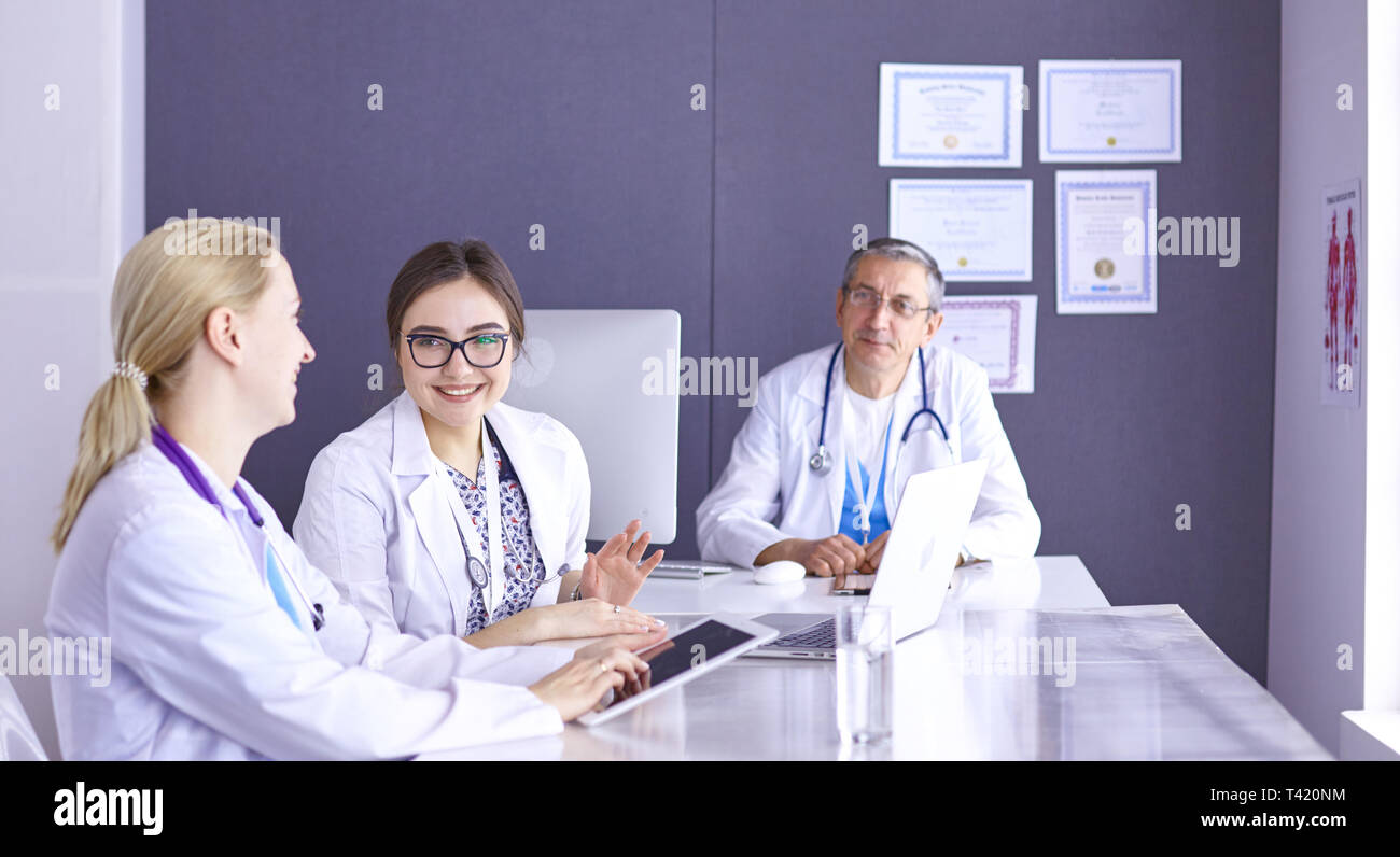 Doctors having a medical discussion in a meeting room Stock Photo - Alamy