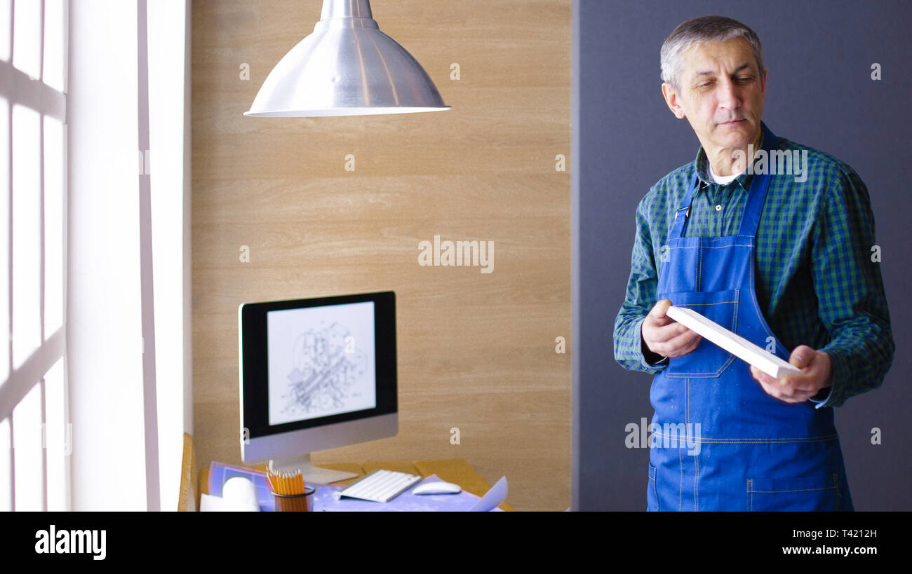 profession, carpentry, woodwork and people concept - carpenter testing ...