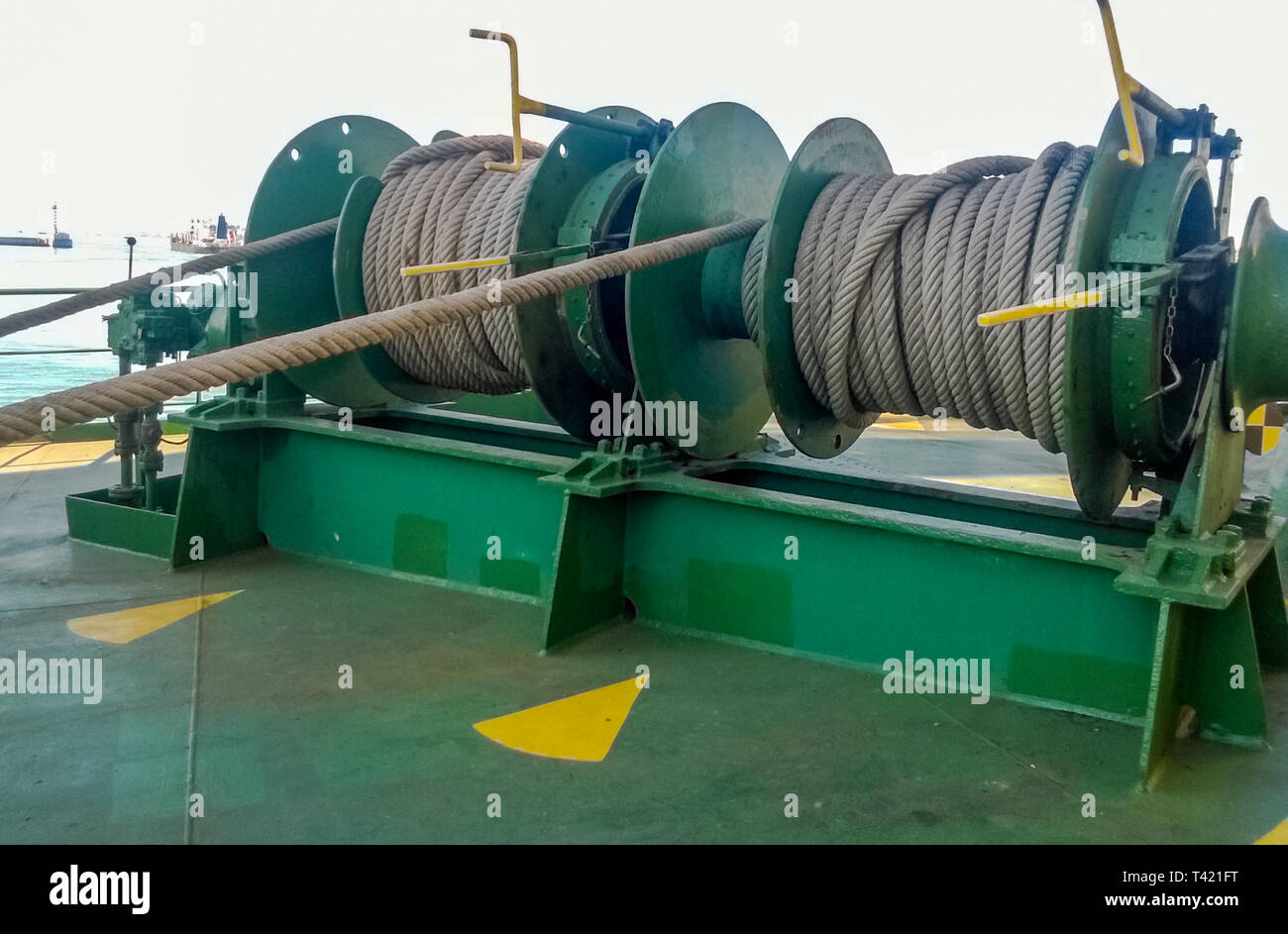 Mechanisms of tension control ropes. Winches. Equipment on the deck of ...