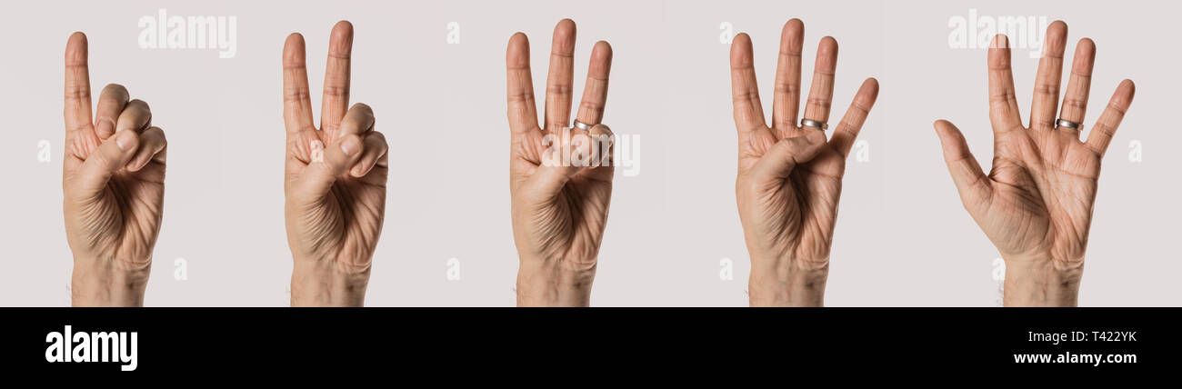 Man`s hand gestures, counting numbers one to five, isolated on white ...