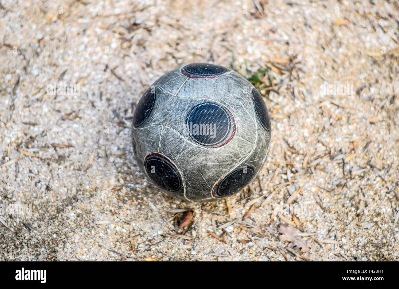 Soccer ball on the ground. The ball is for the games of the yard Stock ...