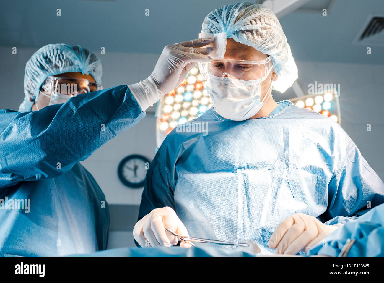 Doctor nurse in protective uniforms hi-res stock photography and images ...