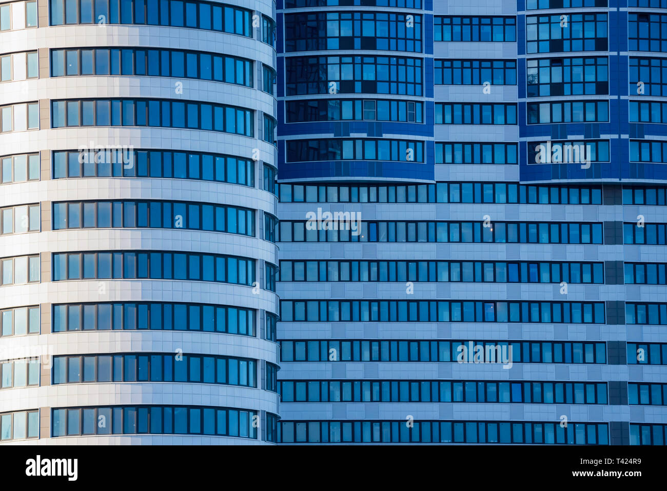 Side of of modern office building with many windows Stock Photo - Alamy