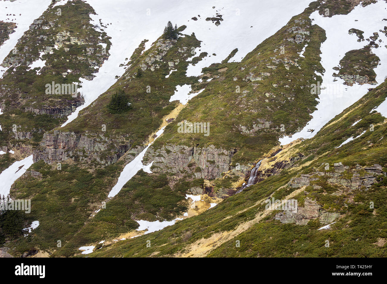 Distant view of powerful, iconic Kopren waterfall and vast, remote ...