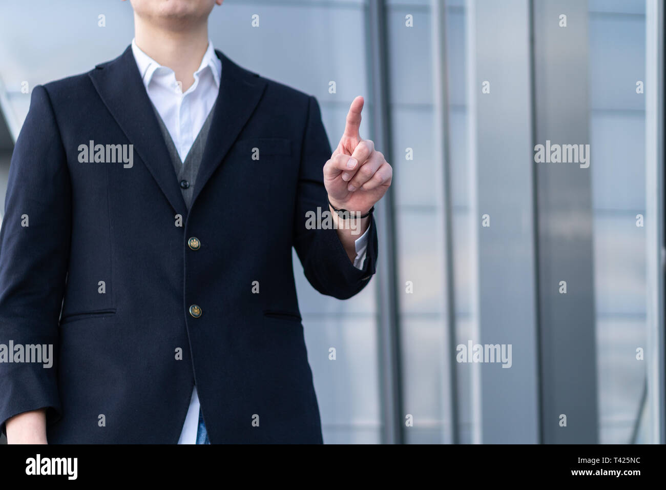 Photo of Business Man pushing on a touch screen interface Stock Photo ...