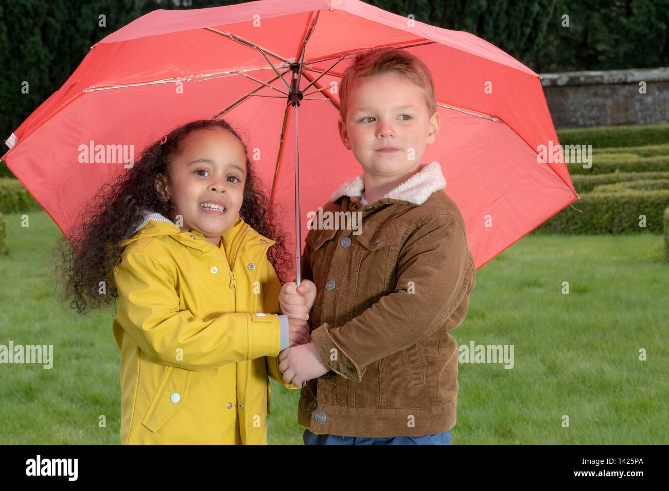 Children skipping enjoying playing outside hi-res stock photography and ...