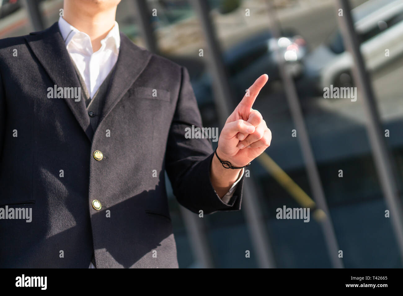 Photo of Business Man pushing on a touch screen interface Stock Photo ...