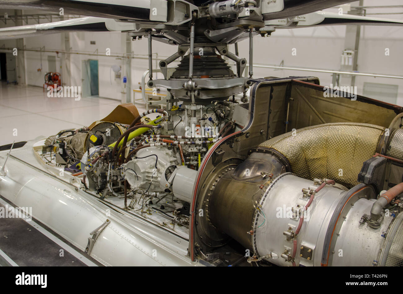 Helicopter gas-turbine engine with the cowling opened for maintenance ...