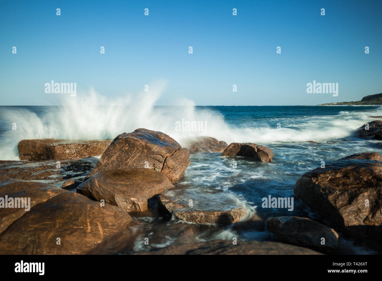 Waves crashing on outcrop hi-res stock photography and images - Alamy