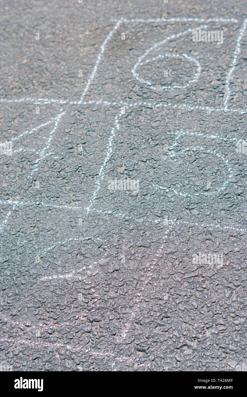 Hopscotch drawing on sidewalk in suburbs Stock Photo - Alamy