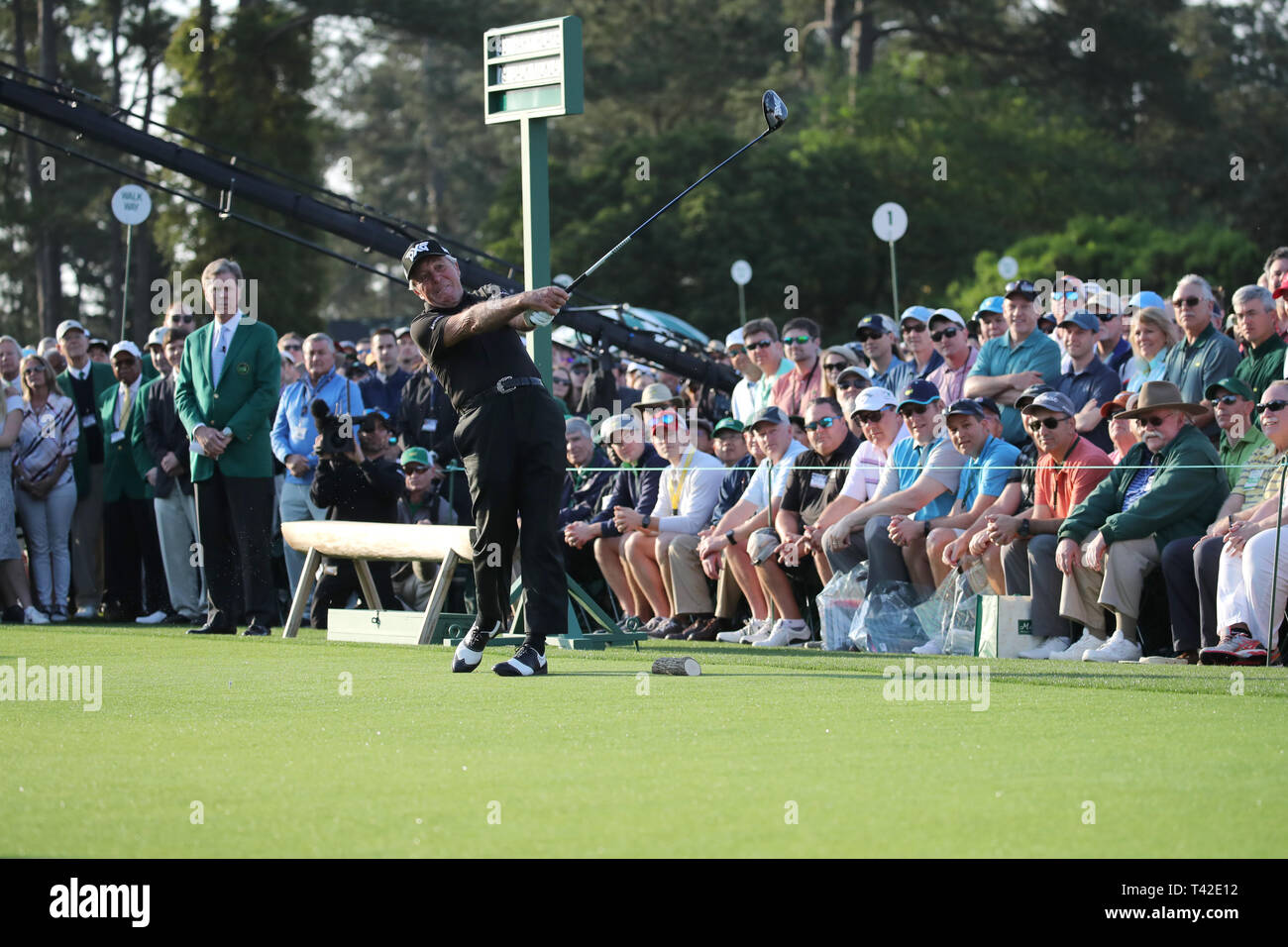 Honorary starter South Africa's Gary Player hits his tee shot on the ...