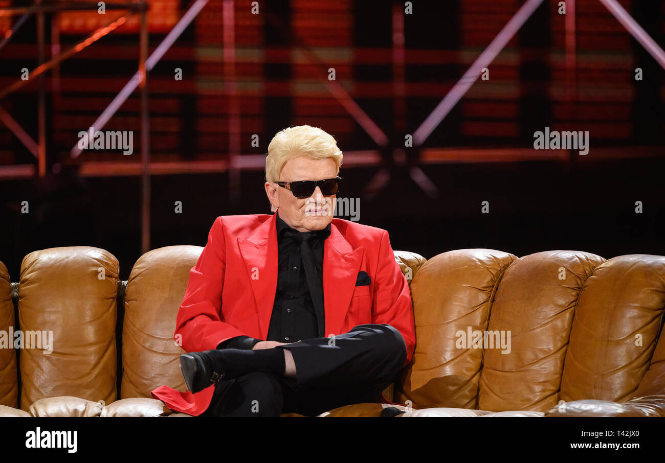 Offenburg, Germany. 12th Apr, 2019. The pop singer Heino sits on the ...