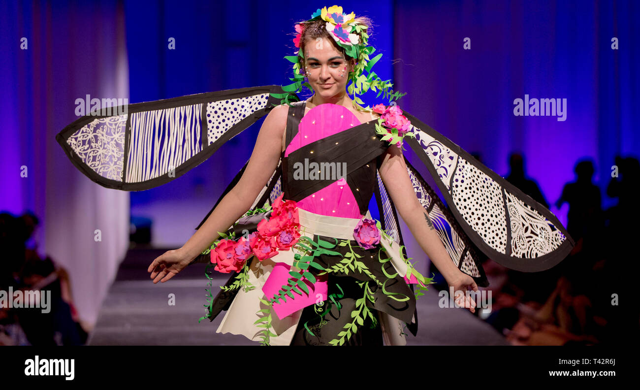 Aurora, Colorado, USA. 12th Apr, 2019. A model walks the runway during ...