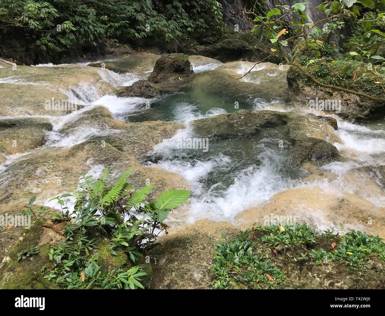 Bihewa Waterfall, a tourist destination in Legari Village at Nabire ...