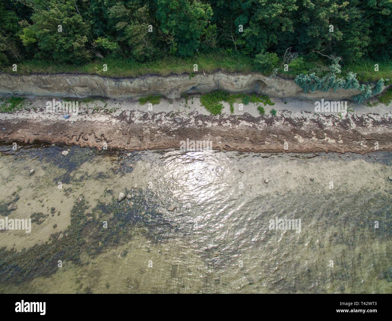 Aerial view of the beautiful beach coastline with cliffs at Poel island ...