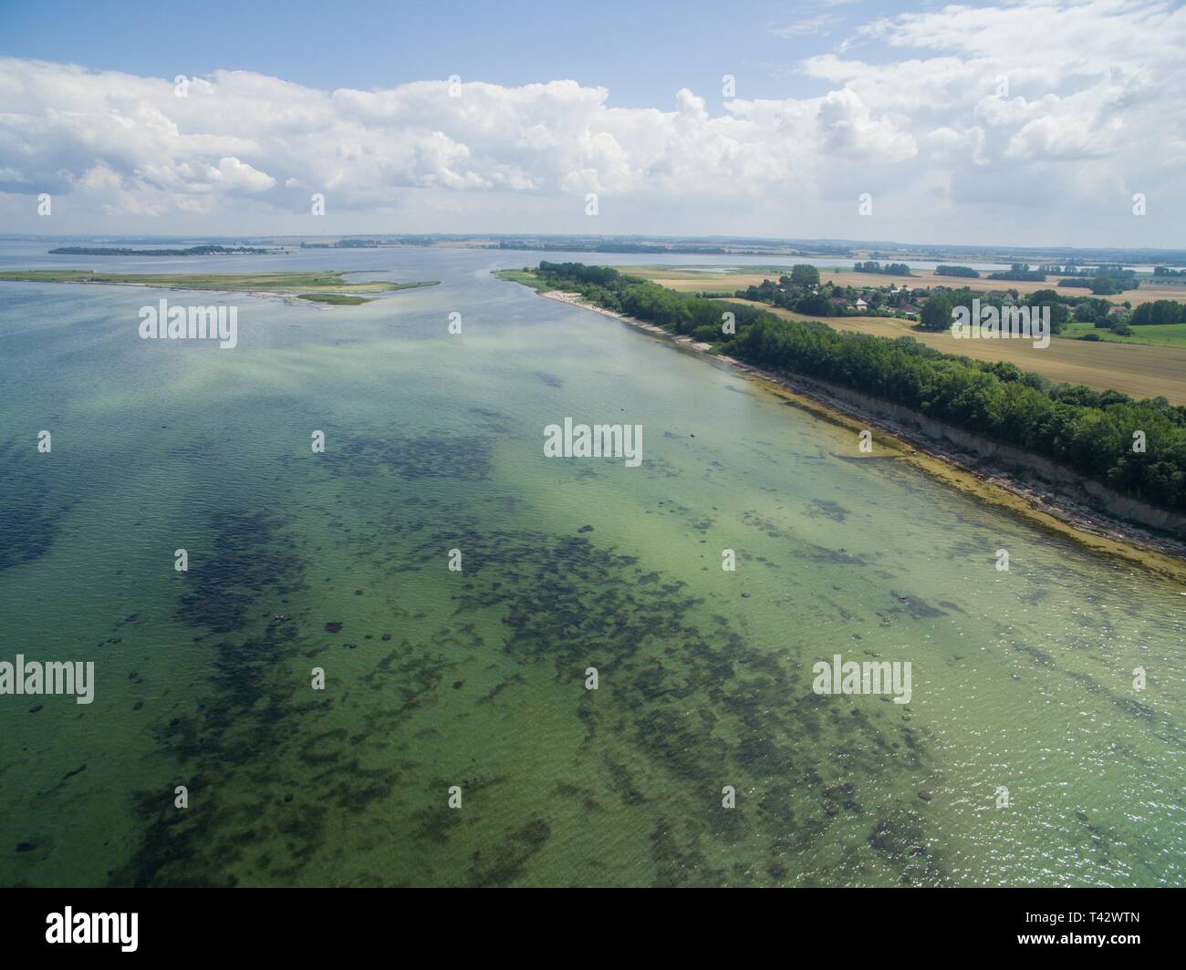 Aerial view of the beautiful beach coastline with cliffs at Poel island ...