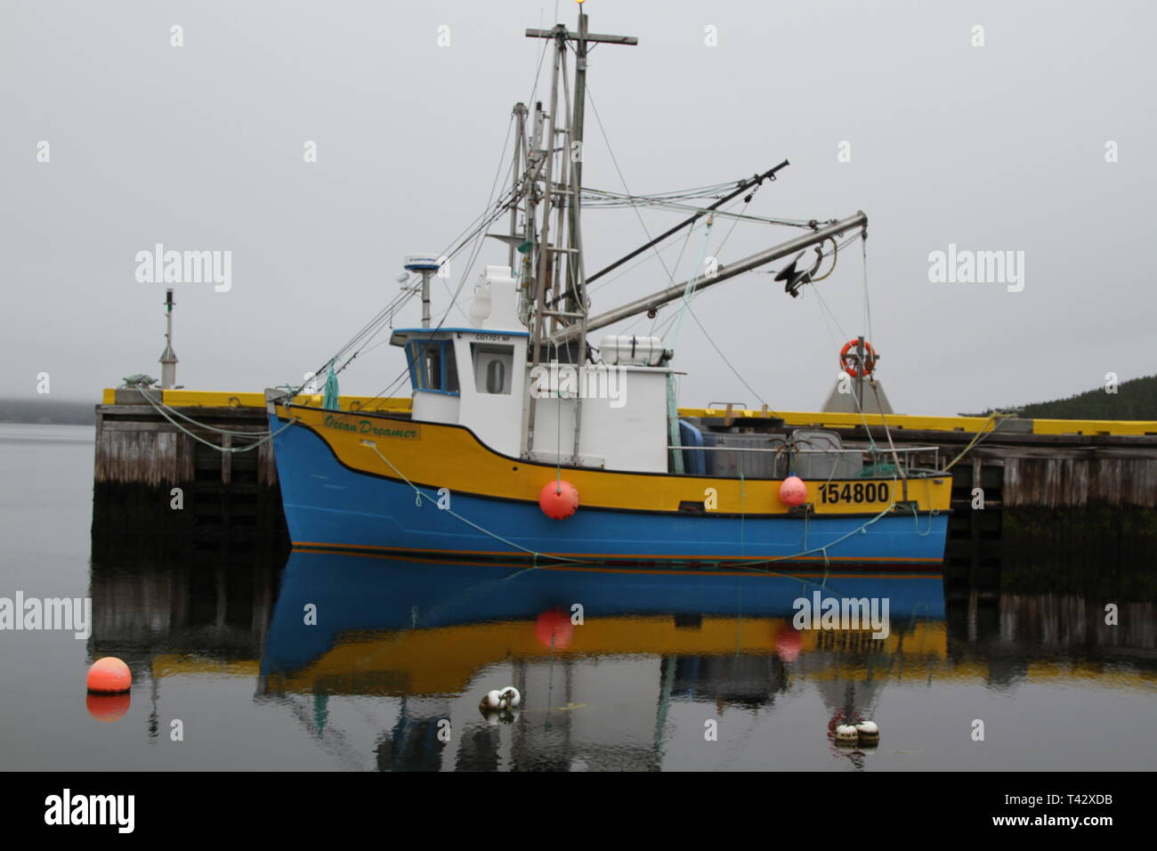 Newfoundland fishing trawler in a harbour Stock Photo - Alamy