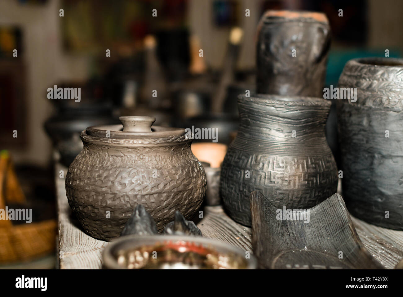 Burnt black ceramics. Burnt clay pots and plates, dishes - Image Stock ...