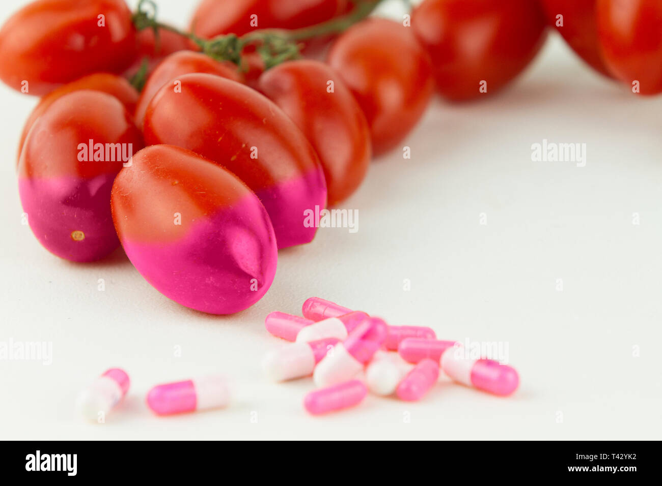 Concept: human GMO manipulation of nature and relative poisoned fruits ...