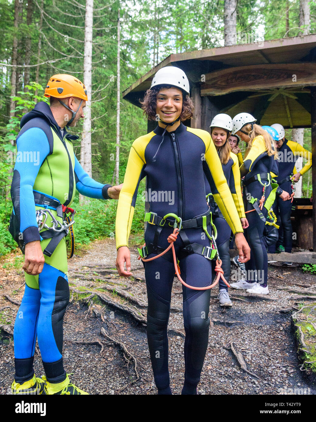Canyoning - guide checking equipment Stock Photo - Alamy