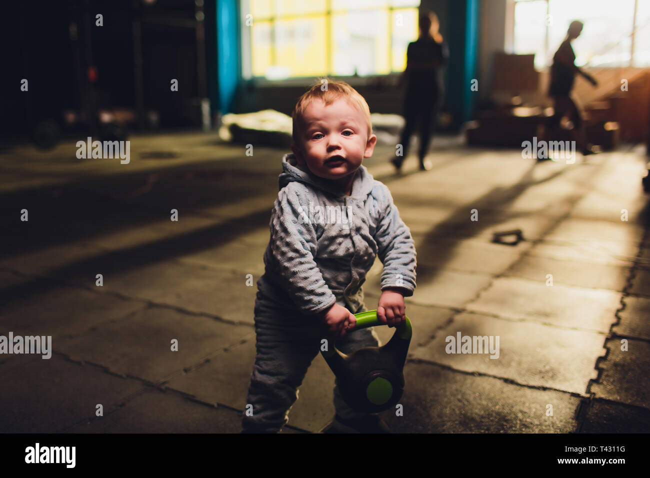 Lifting heavy weight child hi-res stock photography and images - Alamy