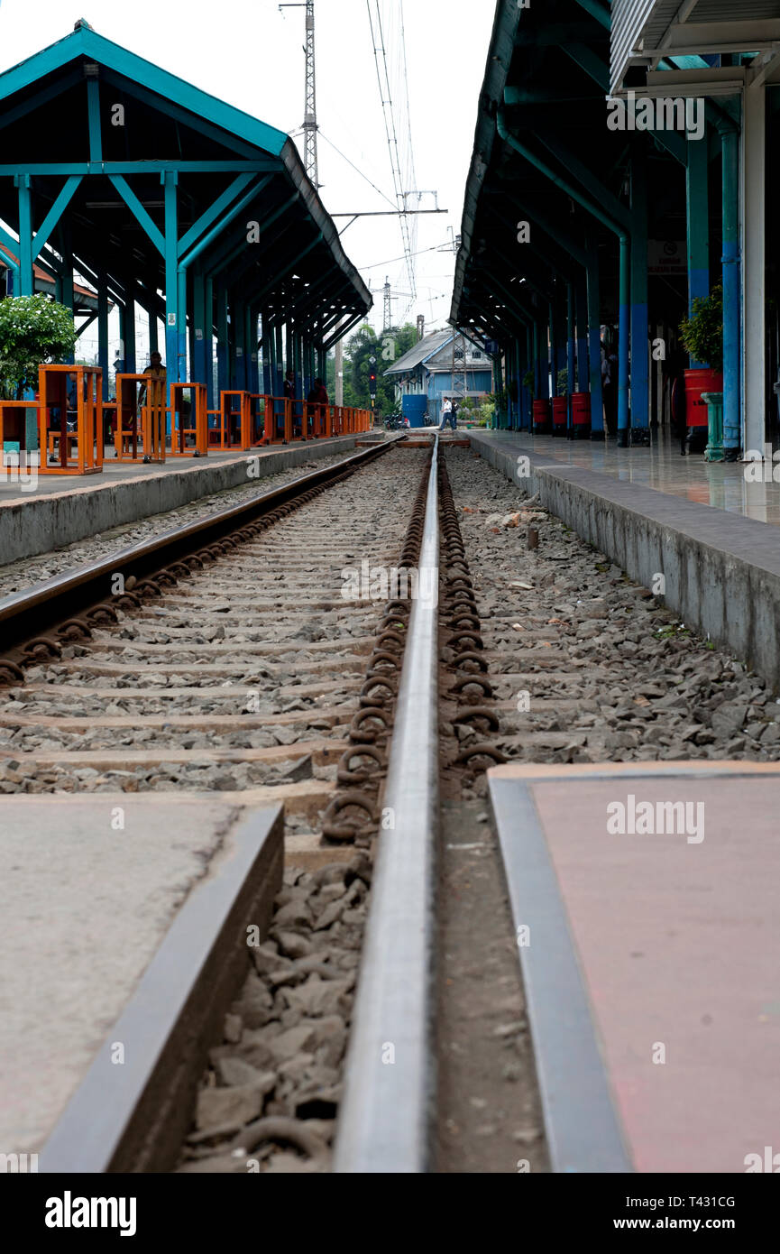 Platform and railroad tracks, Train station, Manggarai district, Jakarta, Indonesia Stock Photo ...