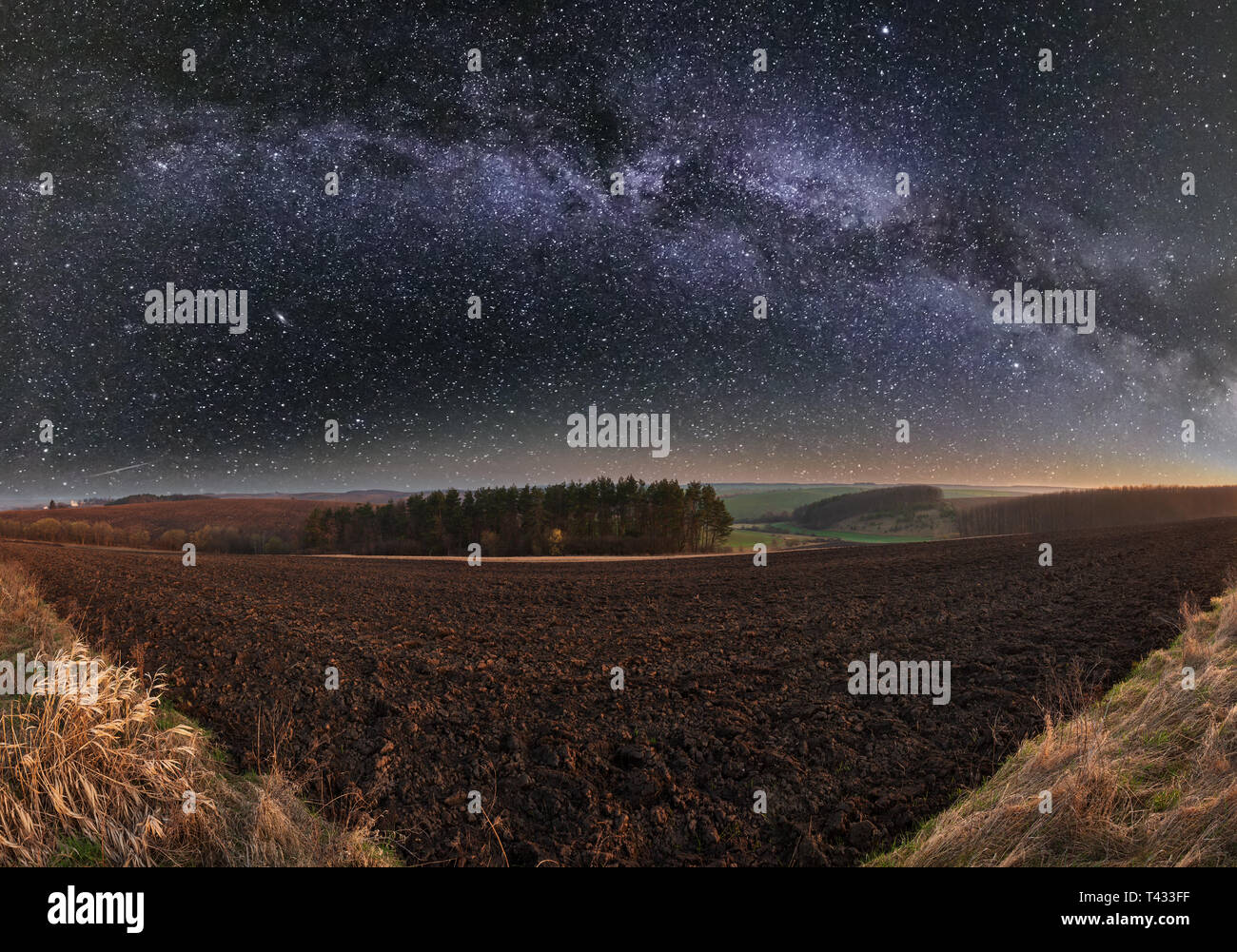 Early spring night rural country landscape with plowed agricultural ...