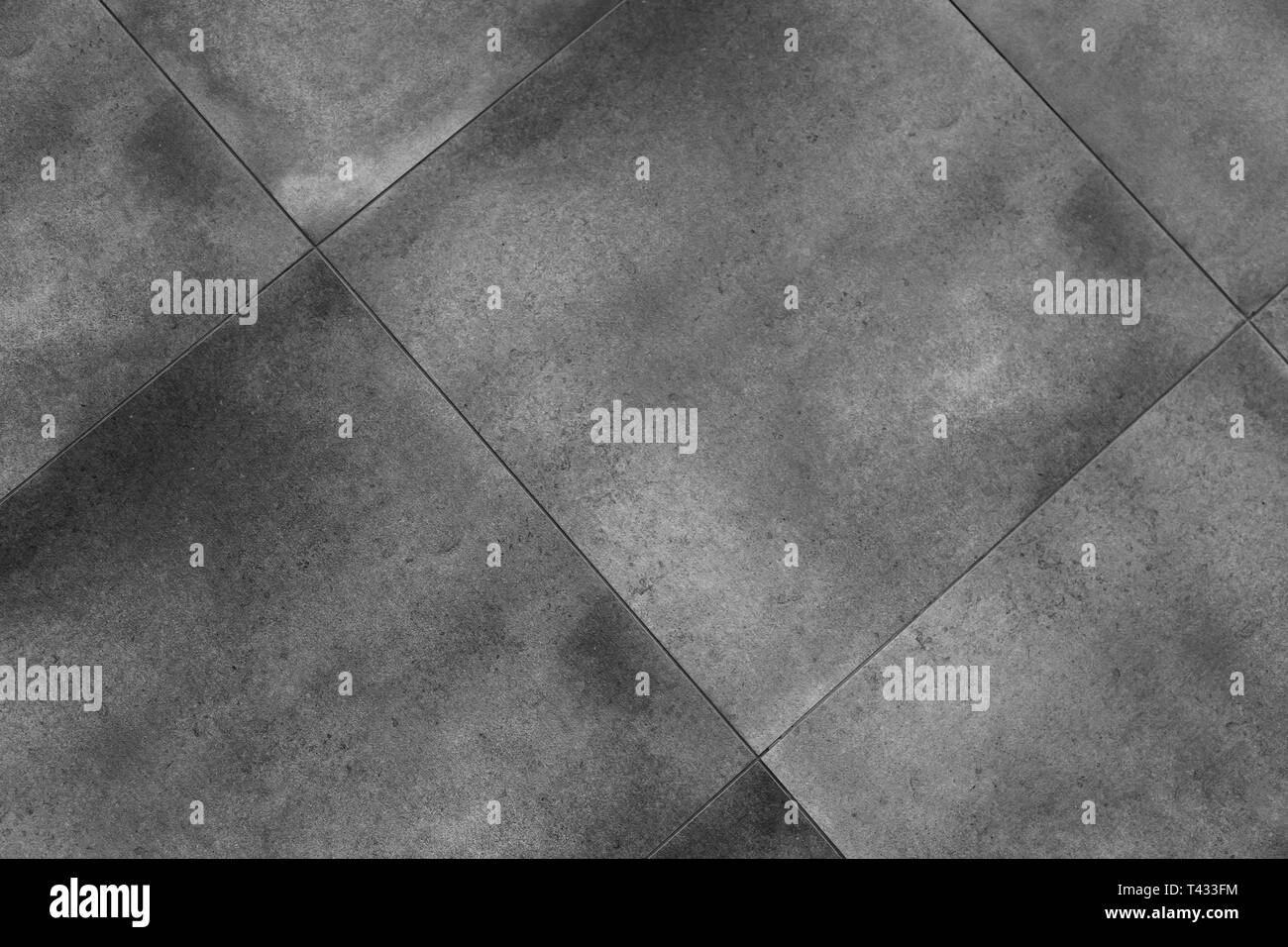 Real gray floor tile pattern for background. Pavement outdoors in ...