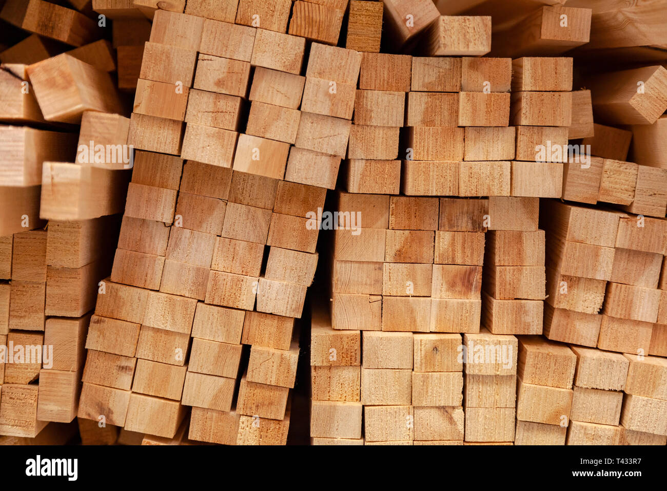 Wall of wooden beams, texture close-up. Close up photo of stack wood ...