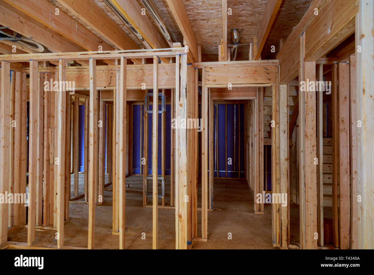 Home Framing unfinished wood building or a house under construction ...
