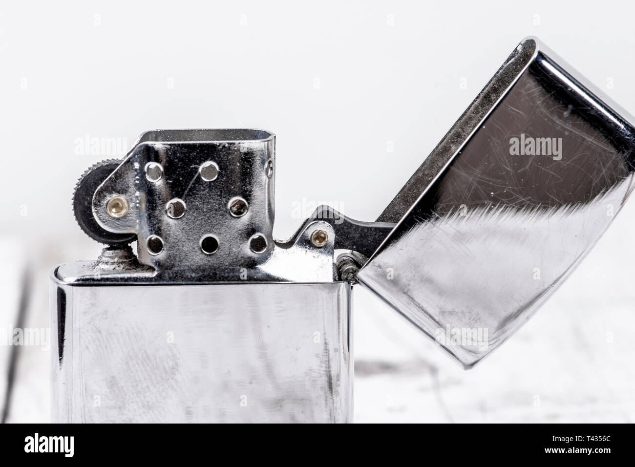 Storm lighter with paraffin in silver Stock Photo - Alamy