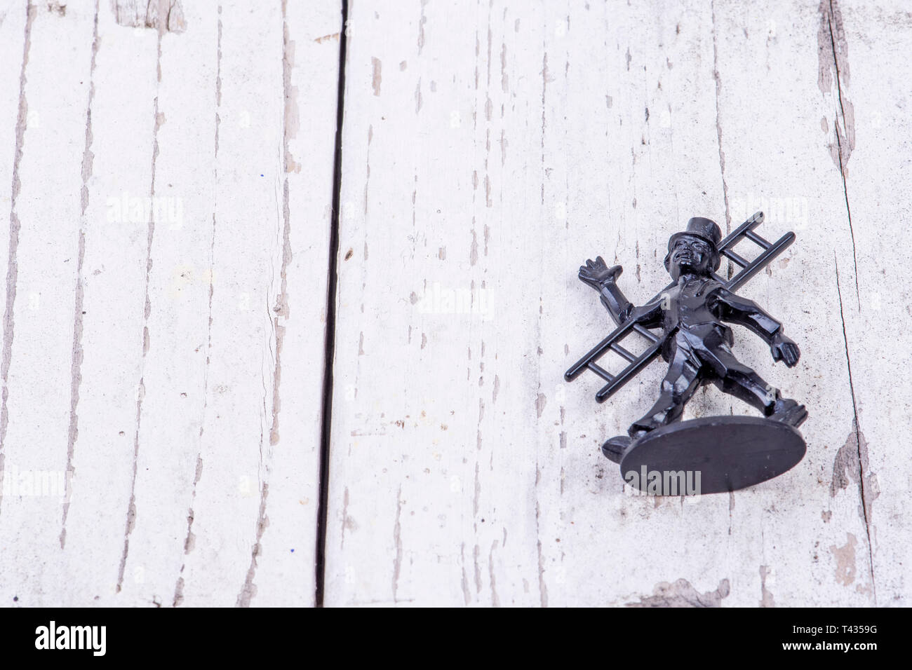 Lucky charm chimney sweep with ladder in small Stock Photo - Alamy