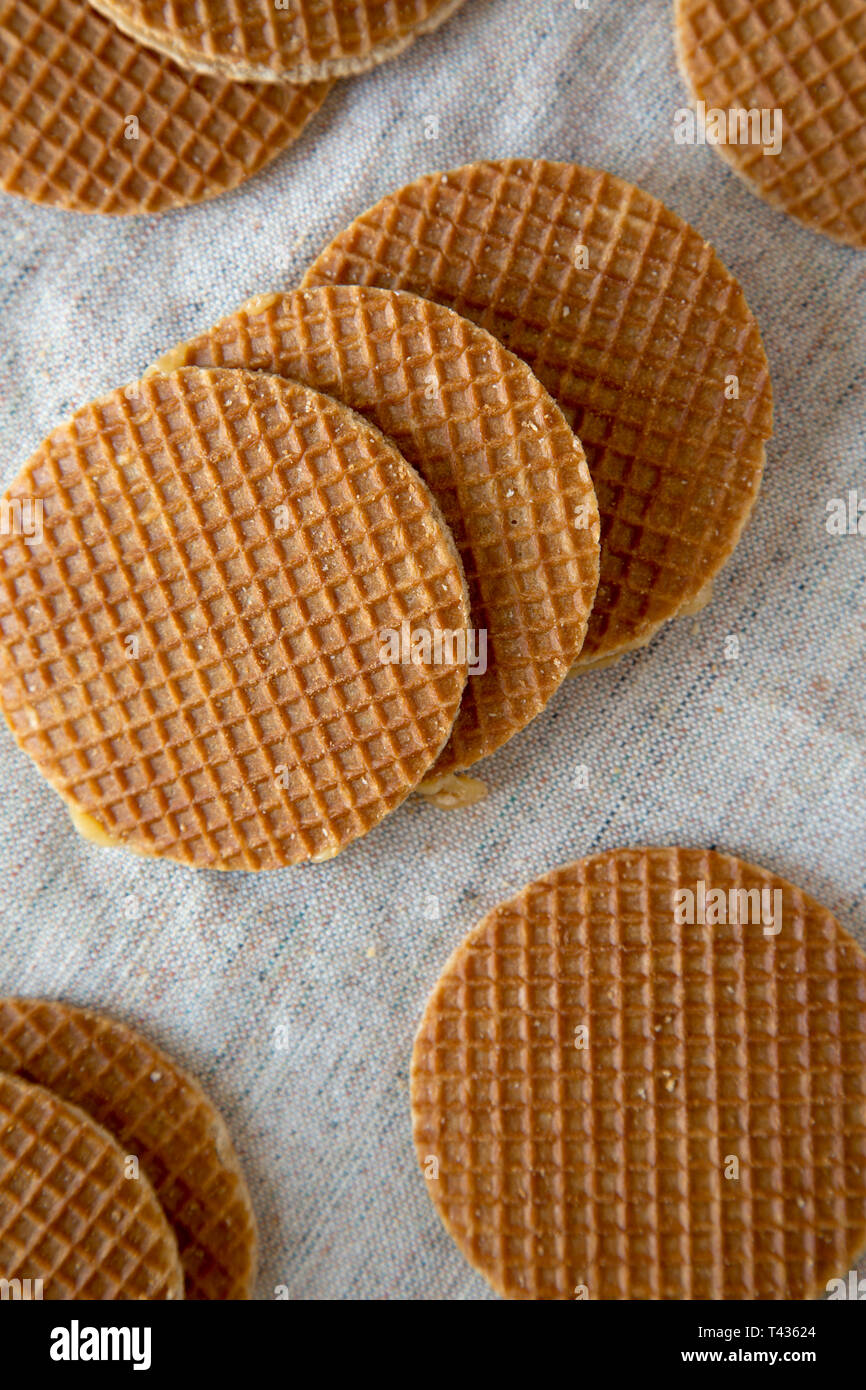 Homemade Dutch caramel waffles on cloth, overhead view. Top view, from ...