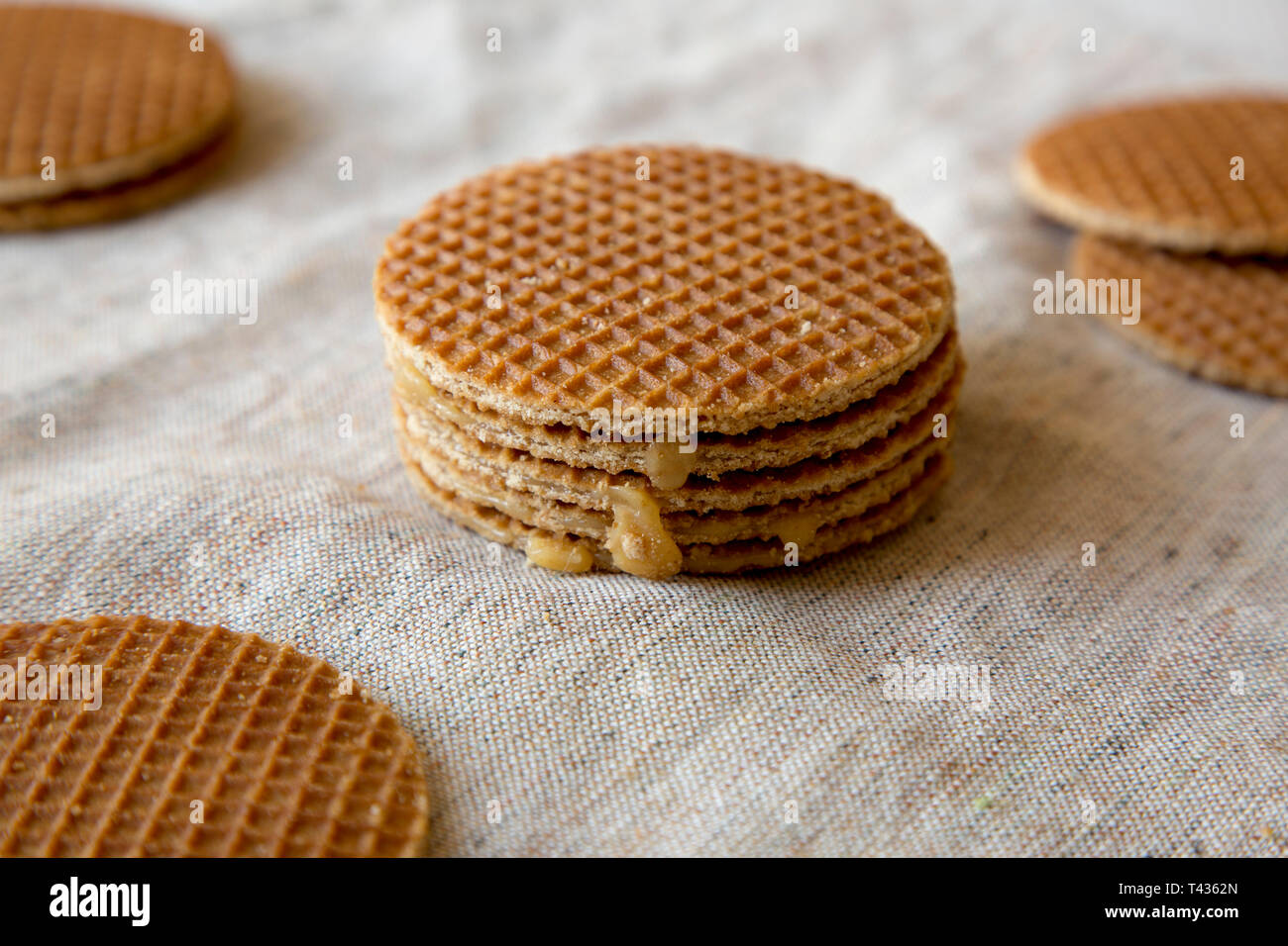 Homemade Dutch caramel waffles on cloth, side view. Close-up Stock ...