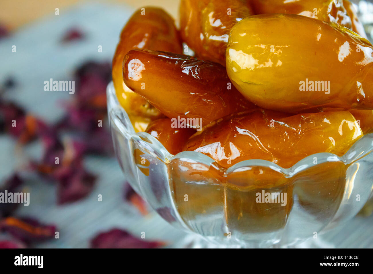 sweet algerian arabic dates fruits on a glass plate Stock Photo - Alamy