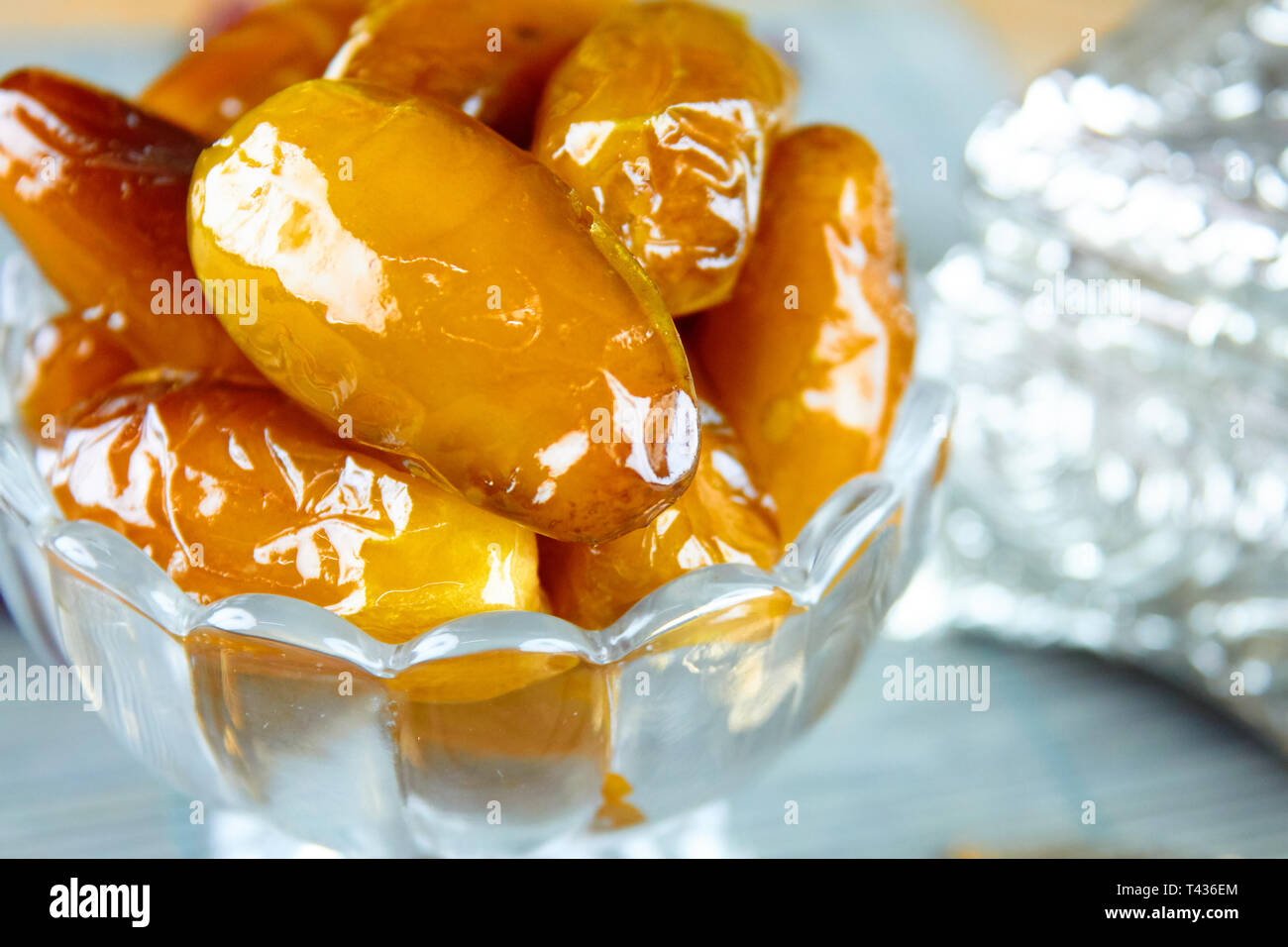 sweet algerian arabic dates fruits on a glass plate Stock Photo - Alamy